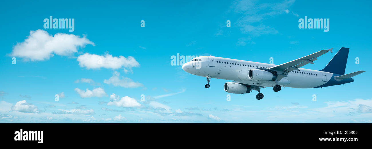 Jet in flight. Panoramic composition Stock Photo - Alamy