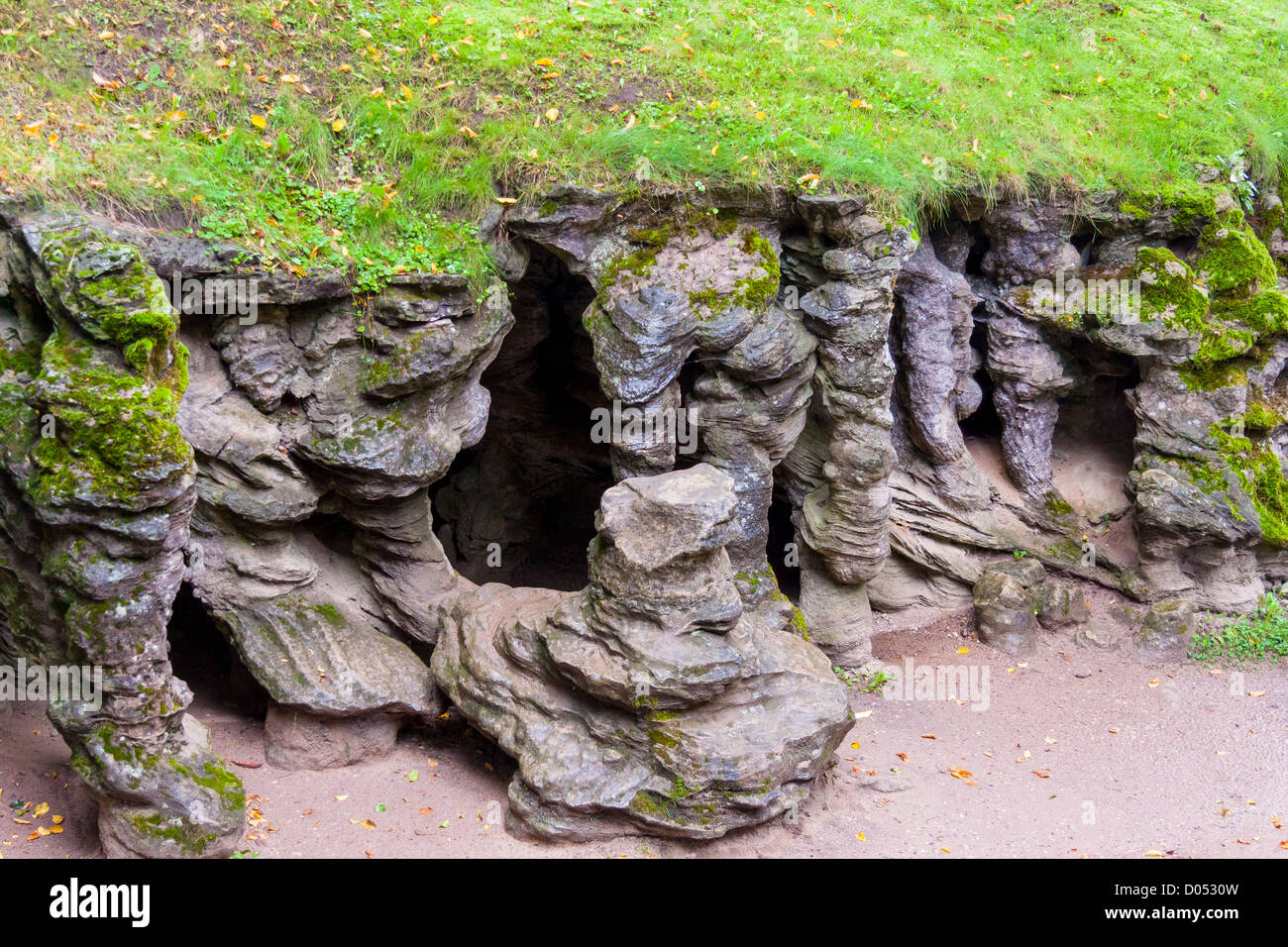 View on entry to small Mechowo cave in Poland Stock Photo - Alamy