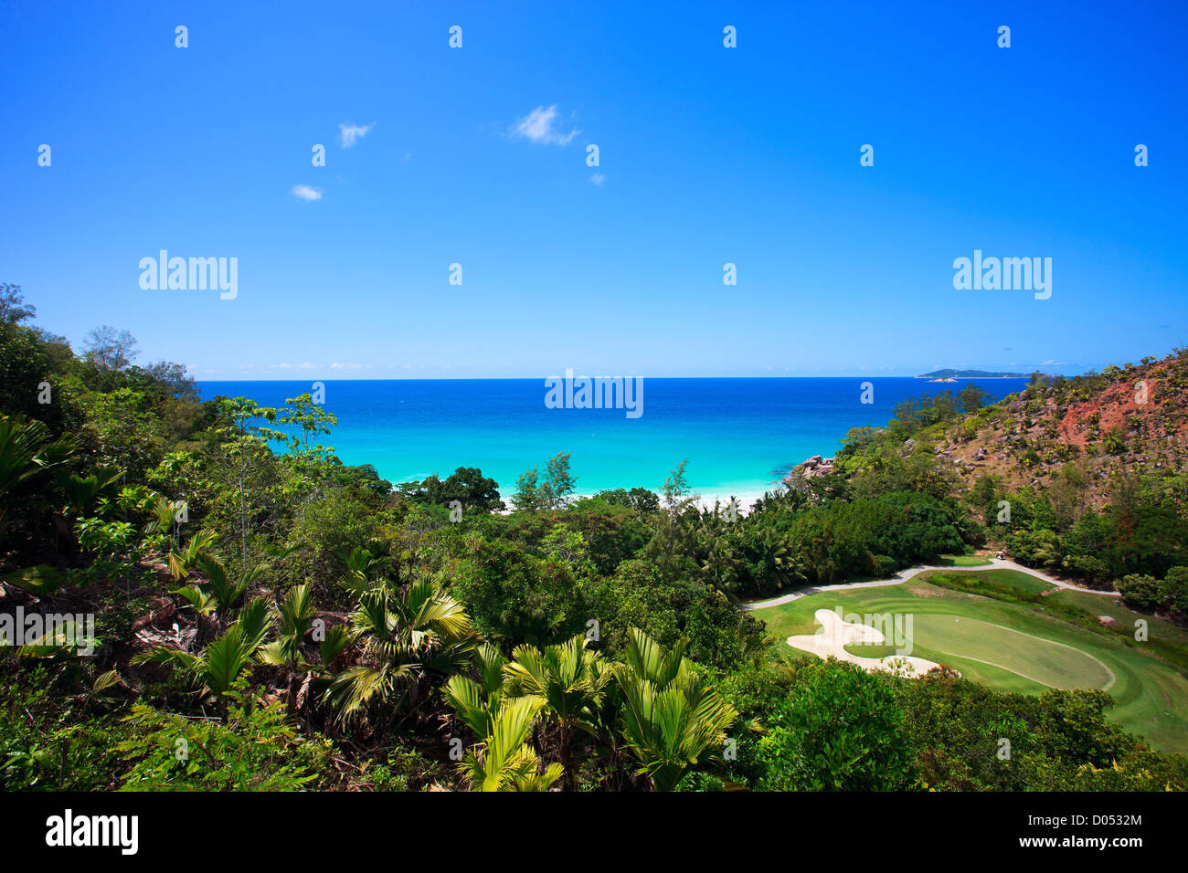 Tropical beach and golf field Stock Photo - Alamy