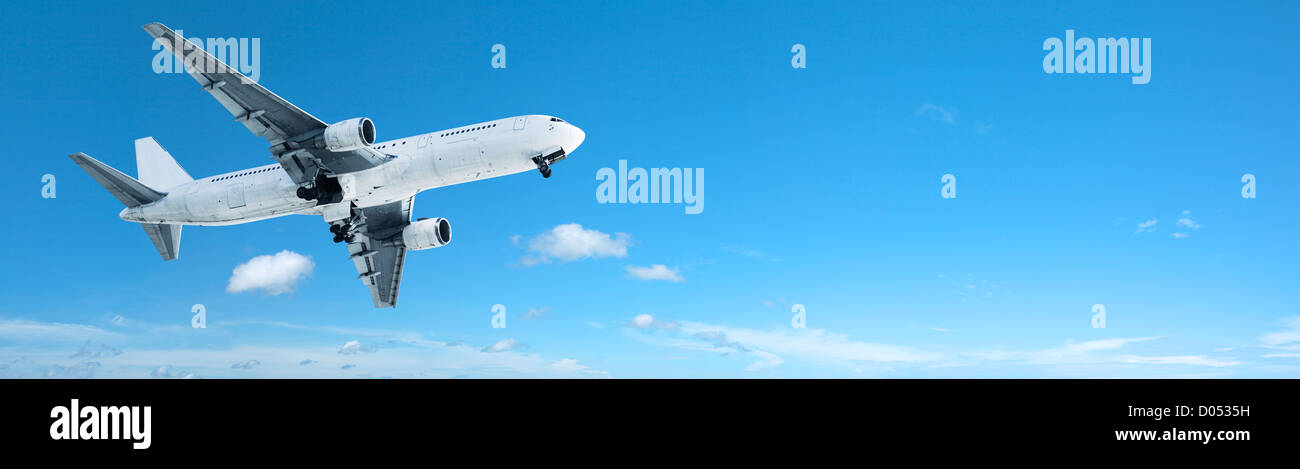 Jet in flight. Panoramic composition Stock Photo - Alamy