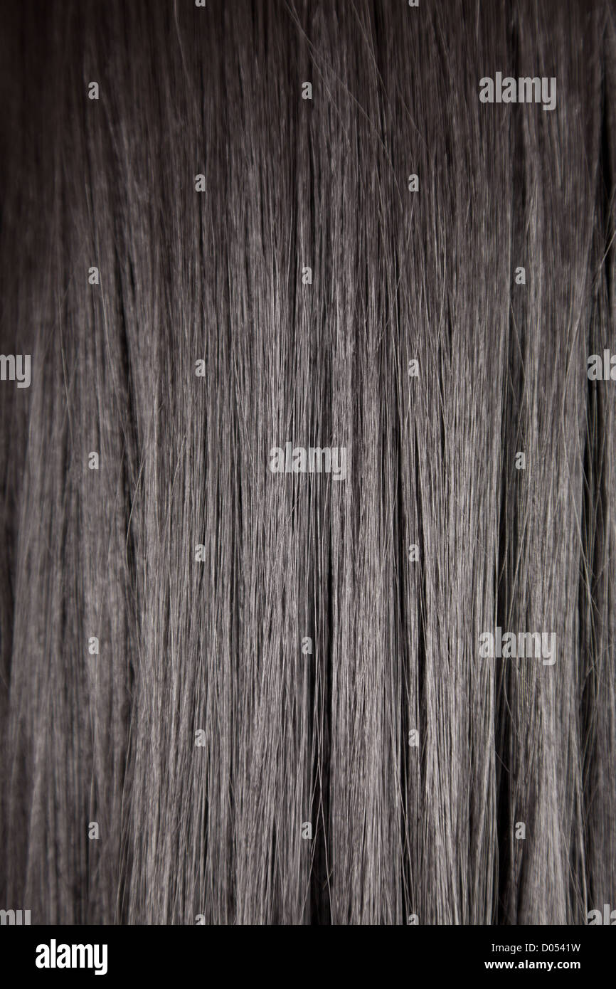 Texture of black shiny straight hair, soft focus Stock Photo - Alamy