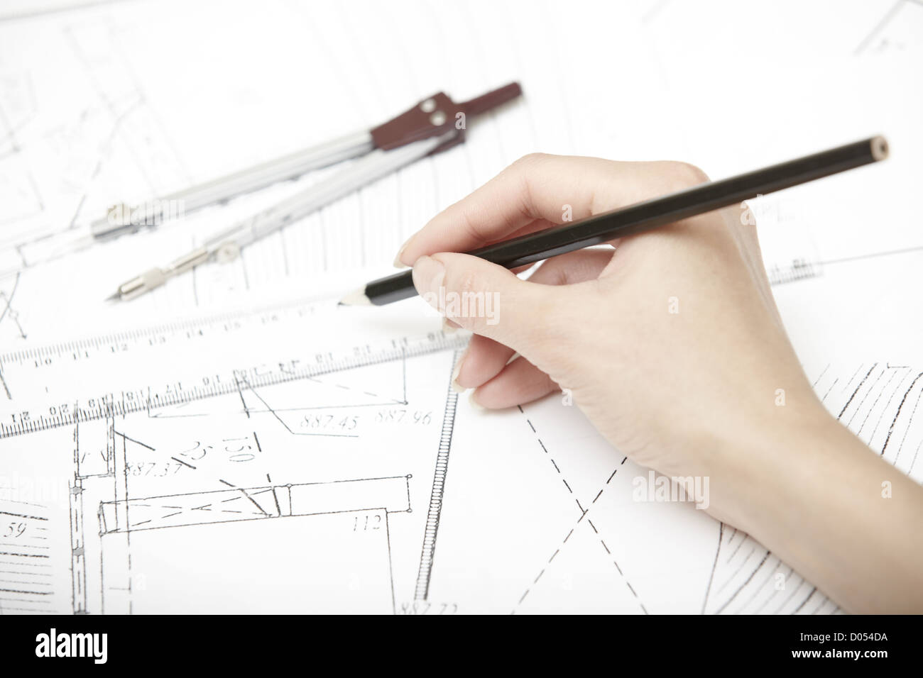 Hand of engineer working on a construction plan Stock Photo - Alamy