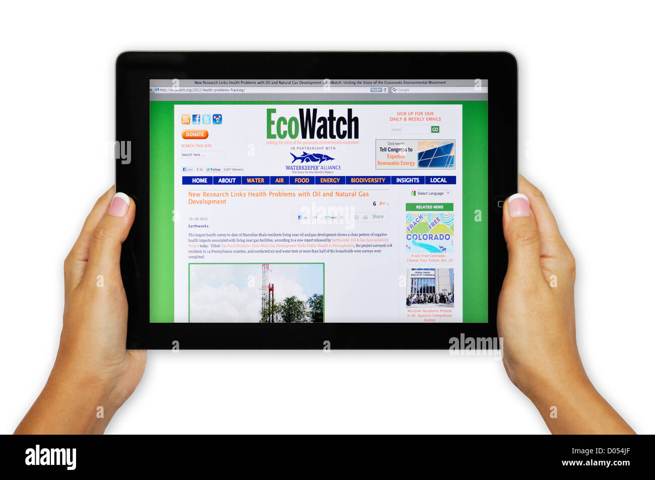 iPad screen showing EcoWatch website - environmental and ecology news ...