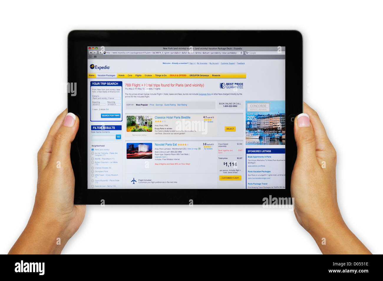 iPad screen showing Expedia website - online trip planning Stock Photo ...