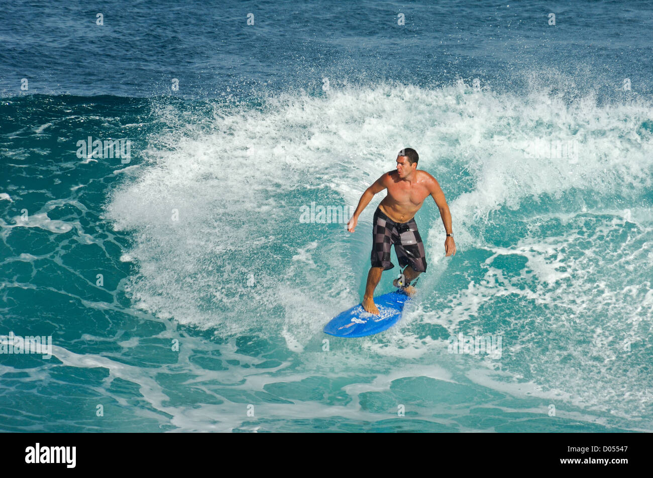 Man surfing at Honolua Bay, Maui Hawaii Stock Photo - Alamy