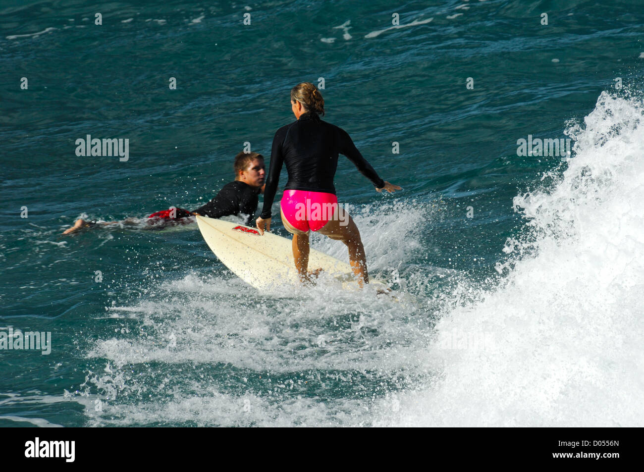 Girl surfing at Honolua Bay Maui Hawaii Stock Photo - Alamy