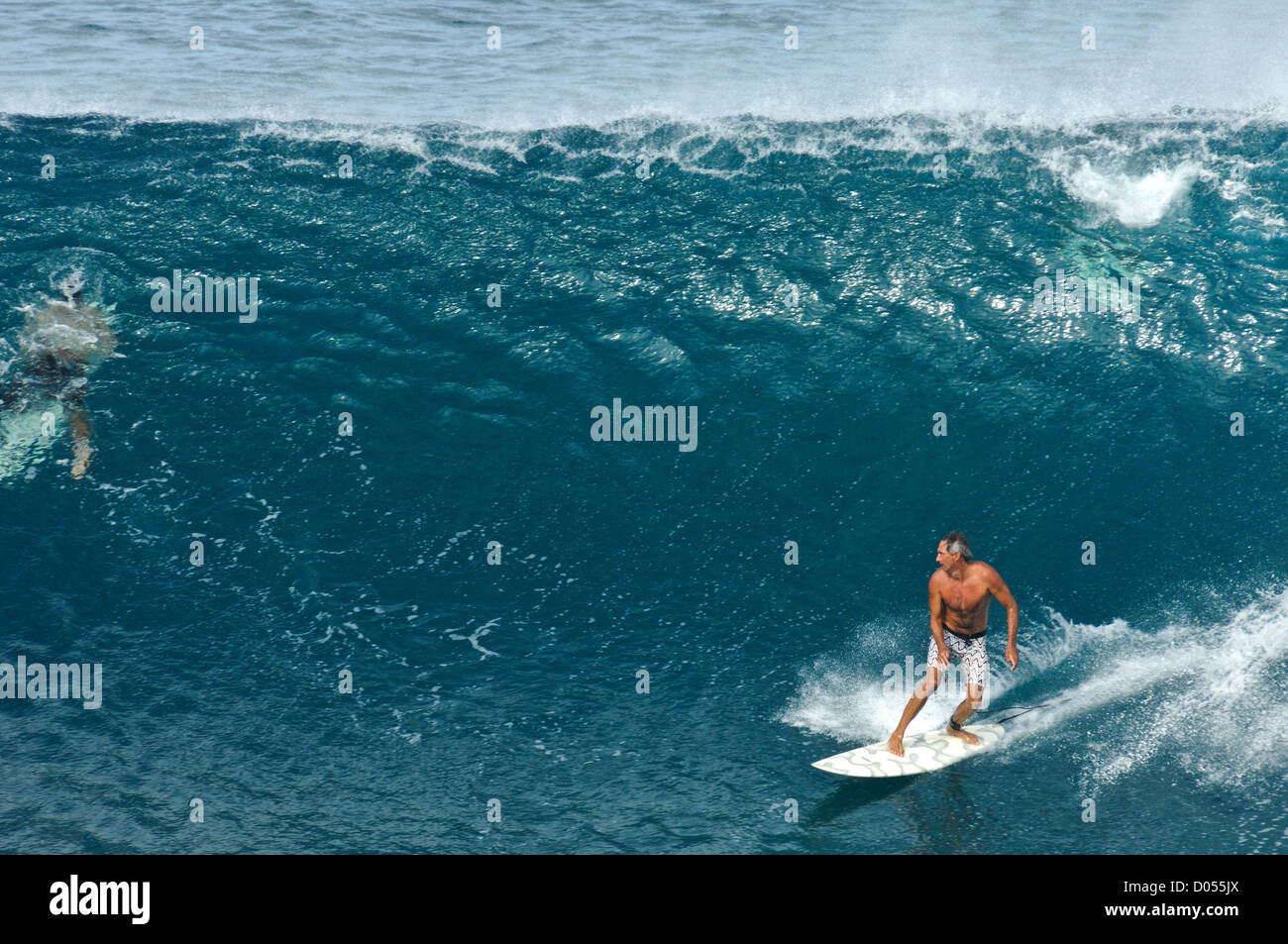 Man surfing big waves at Honolua Bay Maui Hawaii Stock Photo - Alamy