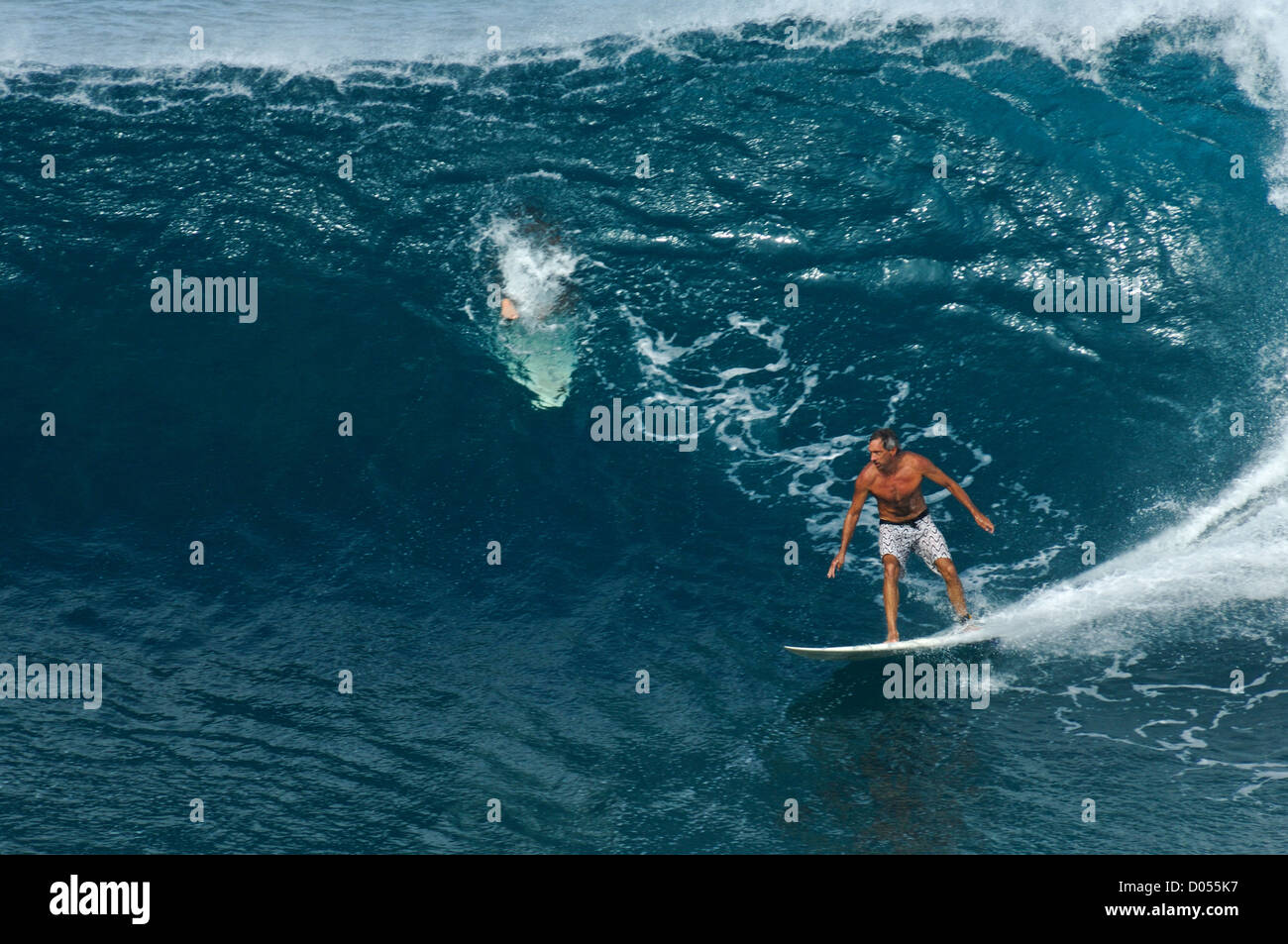 Man surfing big waves at Honolua Bay Maui Hawaii Stock Photo - Alamy