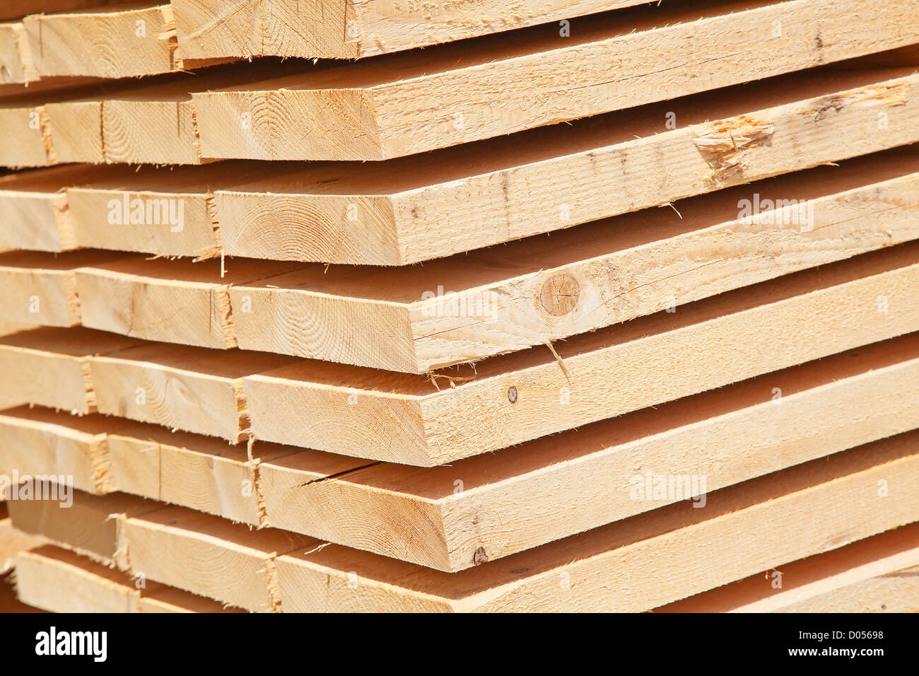 Stack of new wooden studs at the lumber yard Stock Photo - Alamy