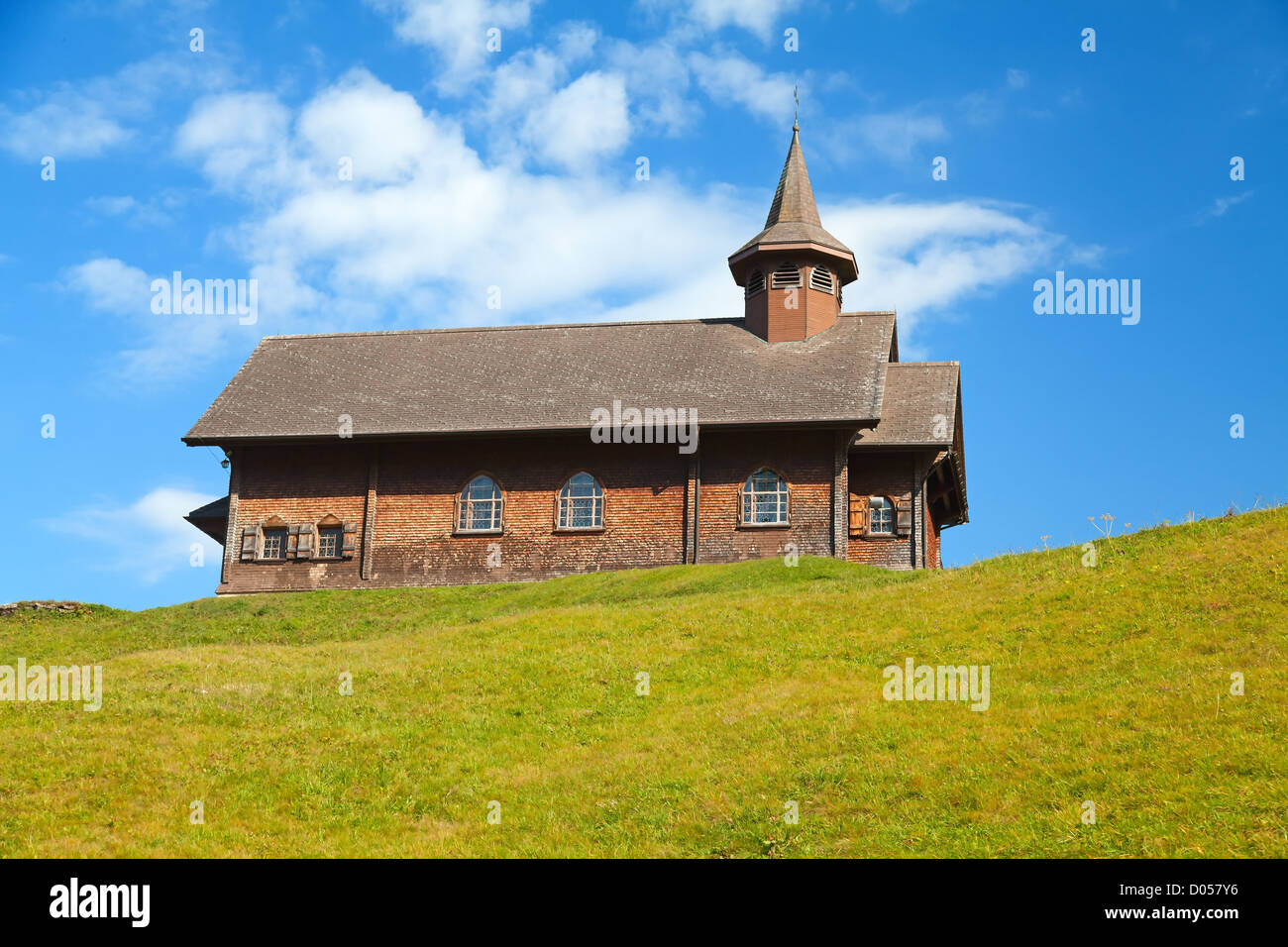 Small wooden church in swiss alps Stock Photo - Alamy