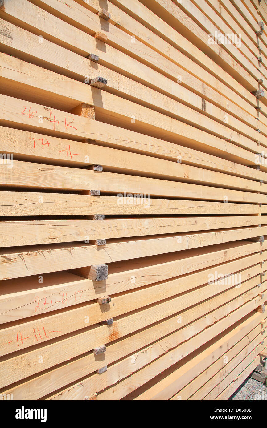 Stack of new wooden studs at the lumber yard Stock Photo - Alamy