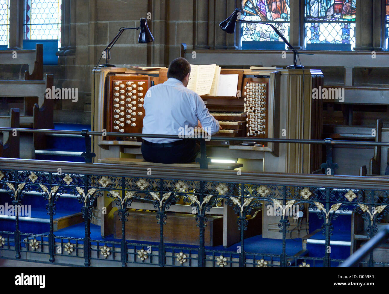 Church organ playing hi-res stock photography and images - Alamy