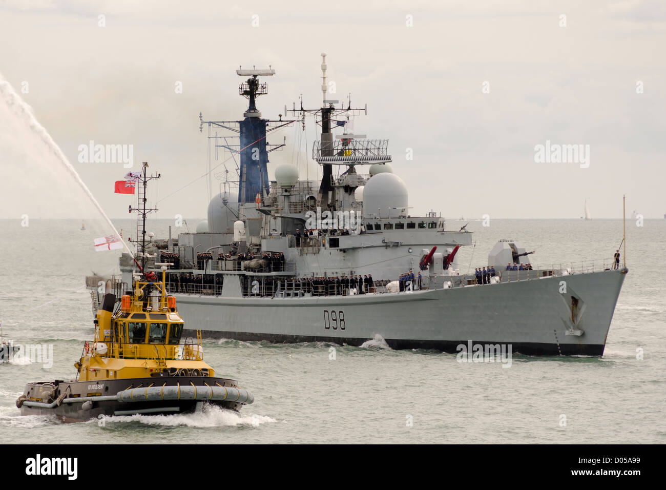 HMS York D98, flying her paying off pennant, cruises into Portsmouth ...
