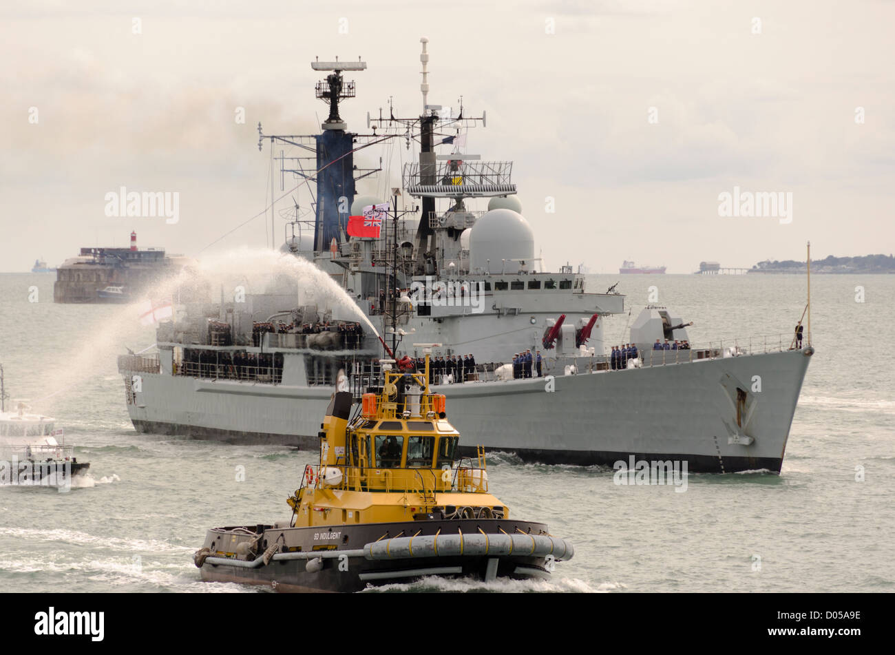 HMS York D98, flying her paying off pennant, cruises into Portsmouth ...