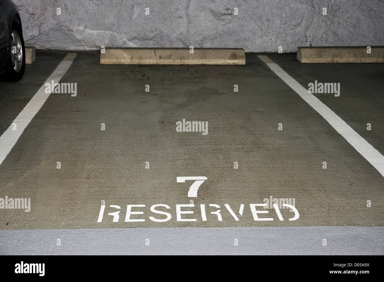 Reserved parking place in garage, New York City, USA Stock Photo - Alamy