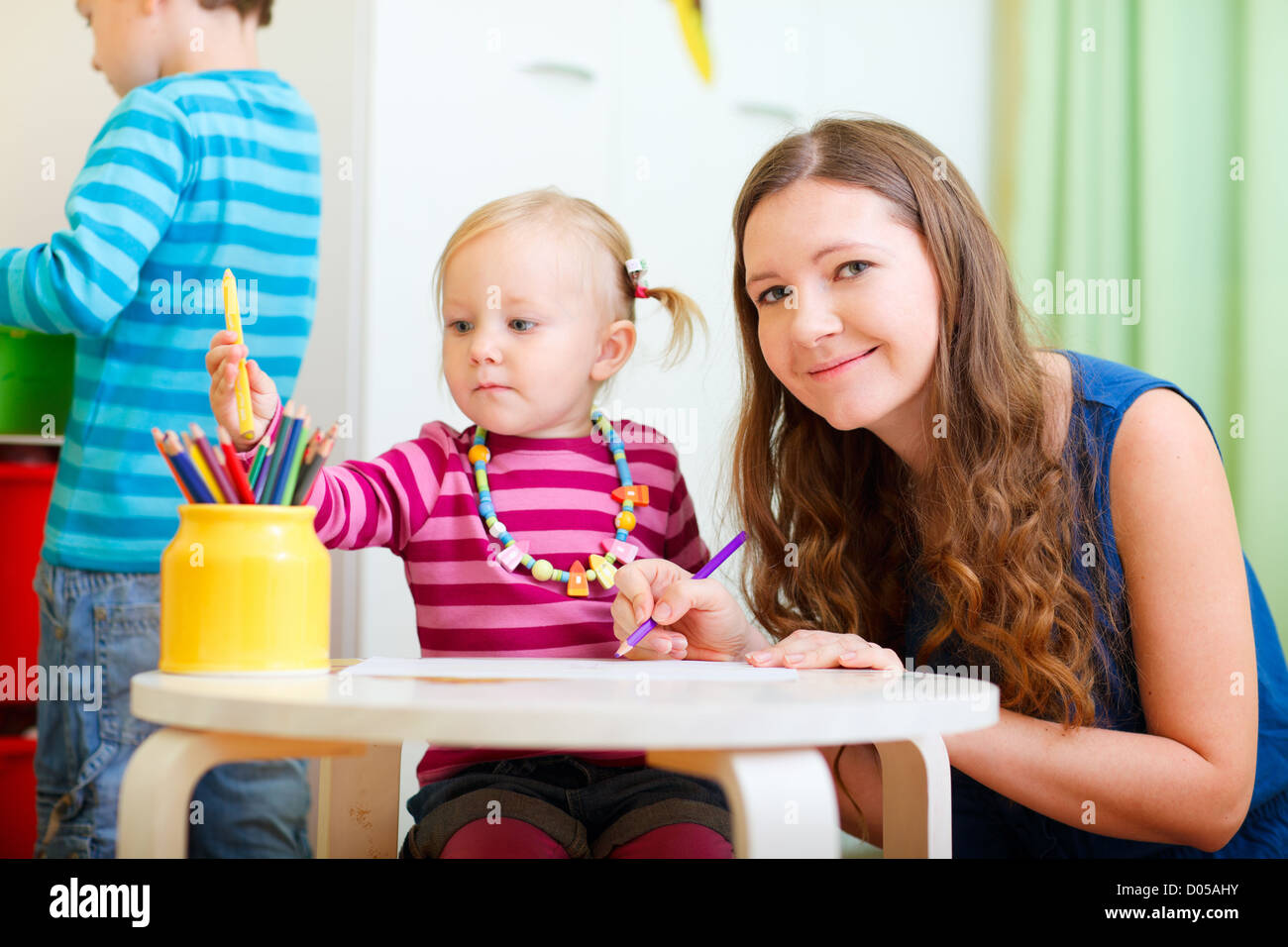 Family at home Stock Photo - Alamy