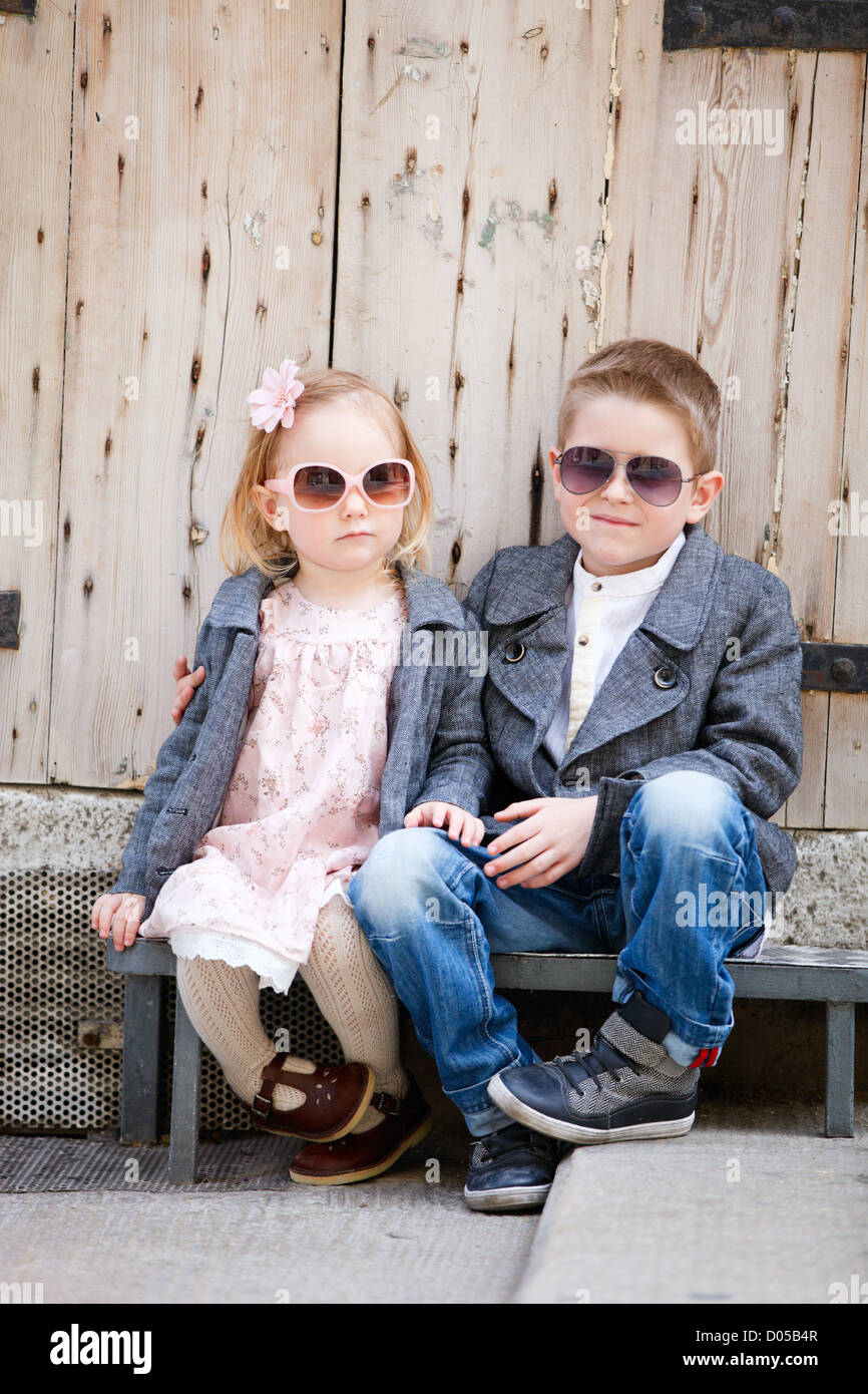 Two kids outdoors Stock Photo - Alamy