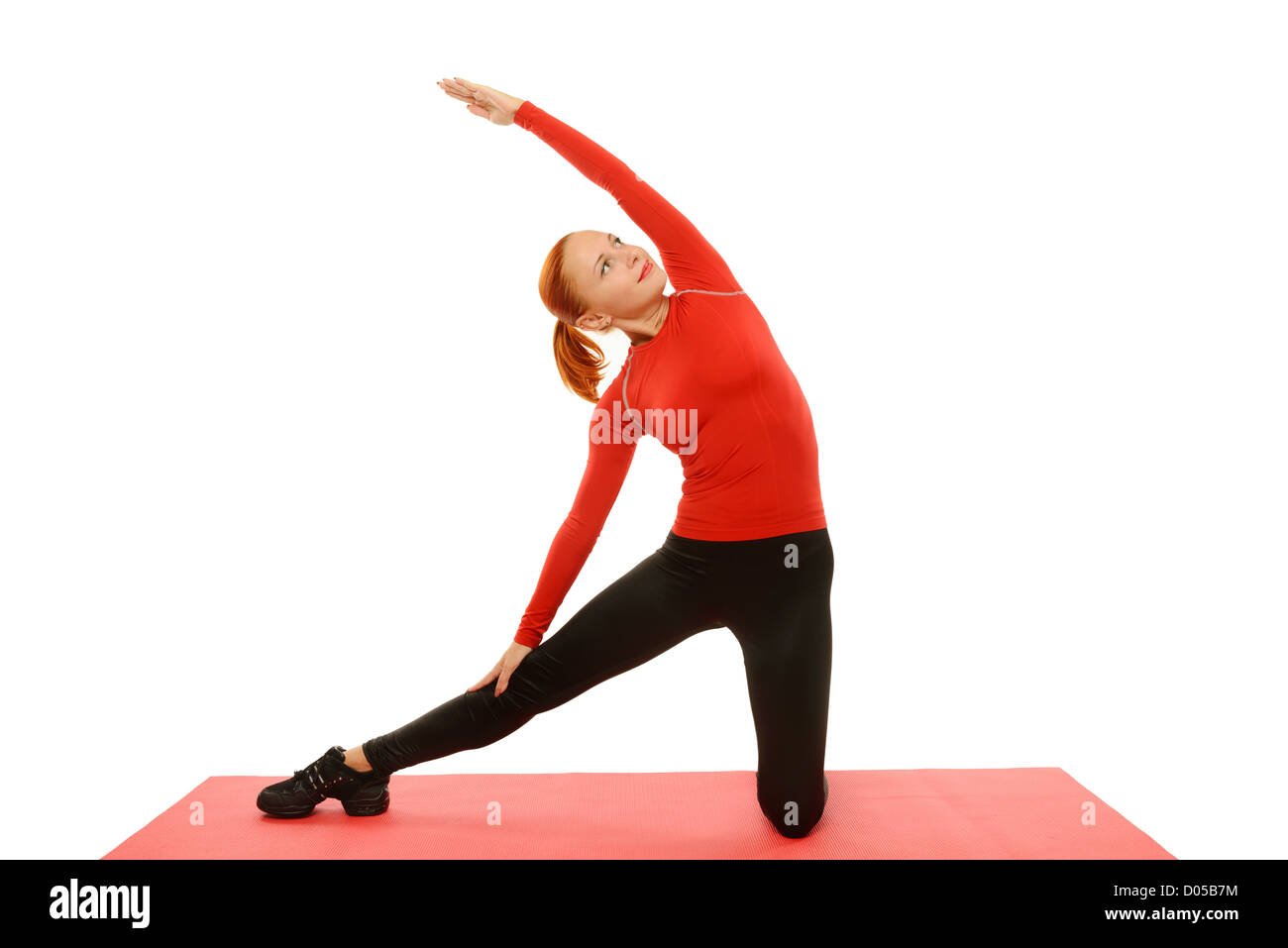 Beautiful slim red fit woman over white background Stock Photo - Alamy