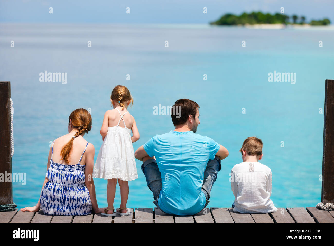 Family enjoying ocean view Stock Photo - Alamy