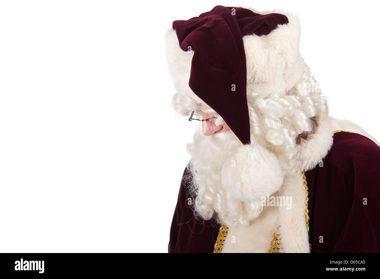 Santa Claus looking down isolated over white background Stock Photo - Alamy