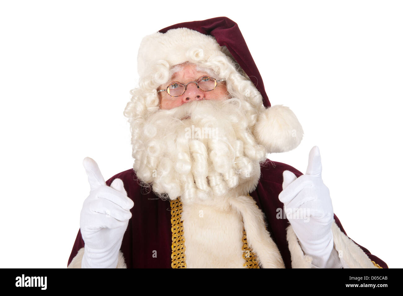 Santa Claus is pointing upwards to something isolated over white ...