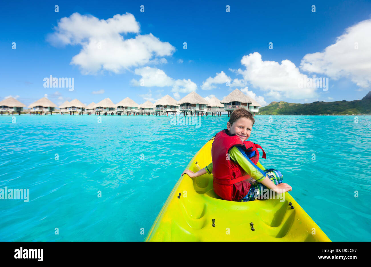 Little boy kayaking Stock Photo - Alamy