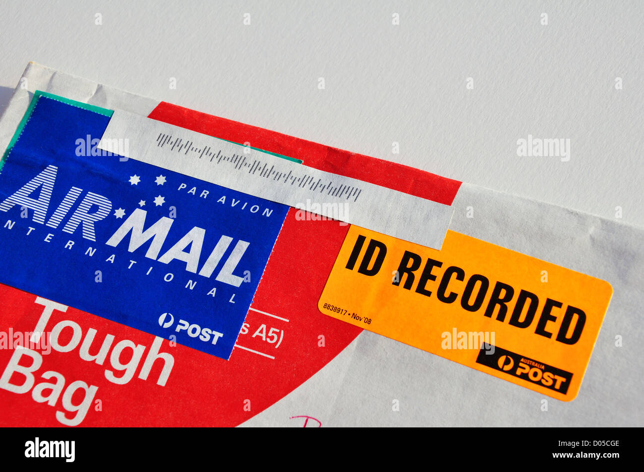 ID RECORDED sticker on mail package envelope Stock Photo - Alamy