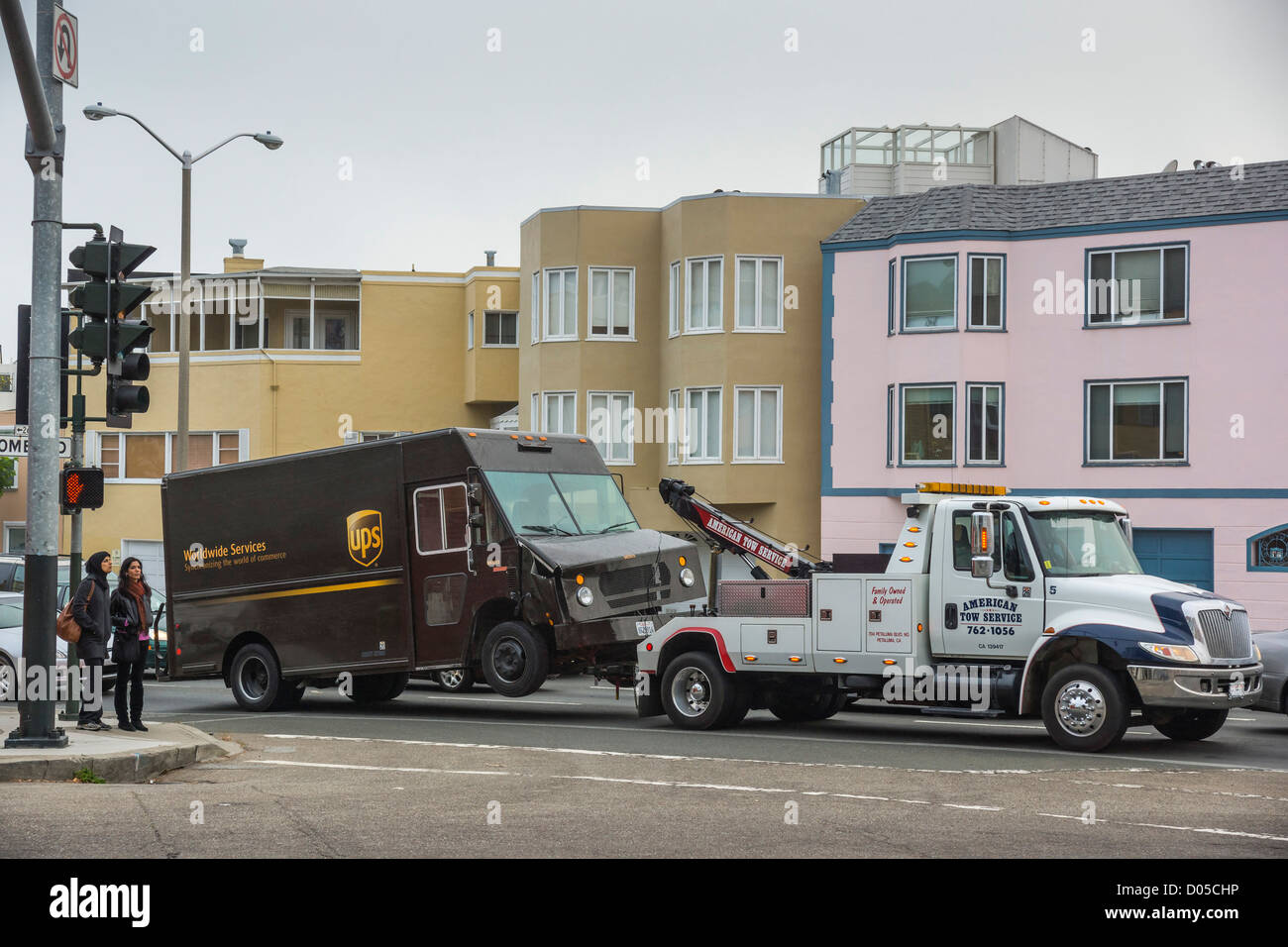 San Francisco - a UPS security delivery van needs a tow-in from ...