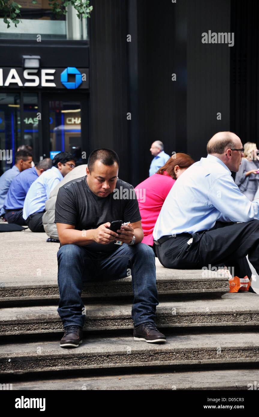 Man using a cell phone, New York City, USA Stock Photo - Alamy