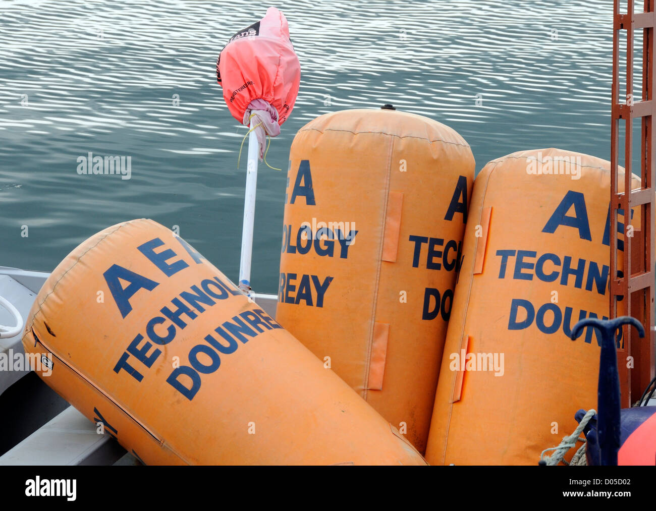 Orange buoys with 'AEA Technology Dounreay' written on them . Scrabster ...