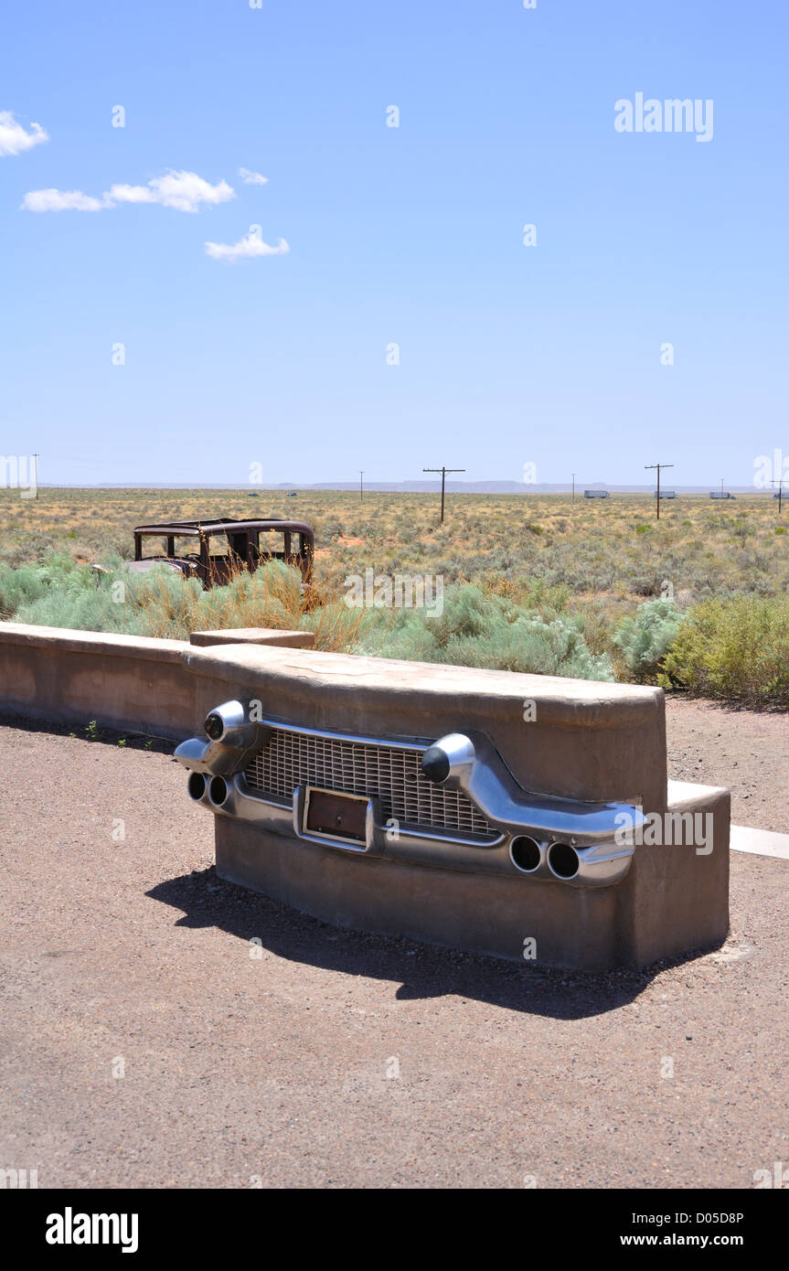 Old rusted car and retro style bench decorated with bumper, Route 66 ...