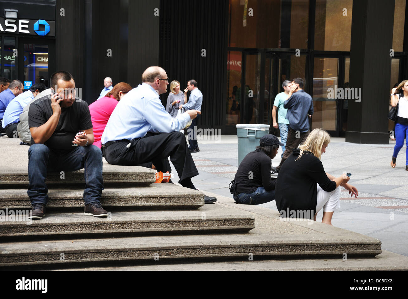 Using phones street hi-res stock photography and images - Alamy
