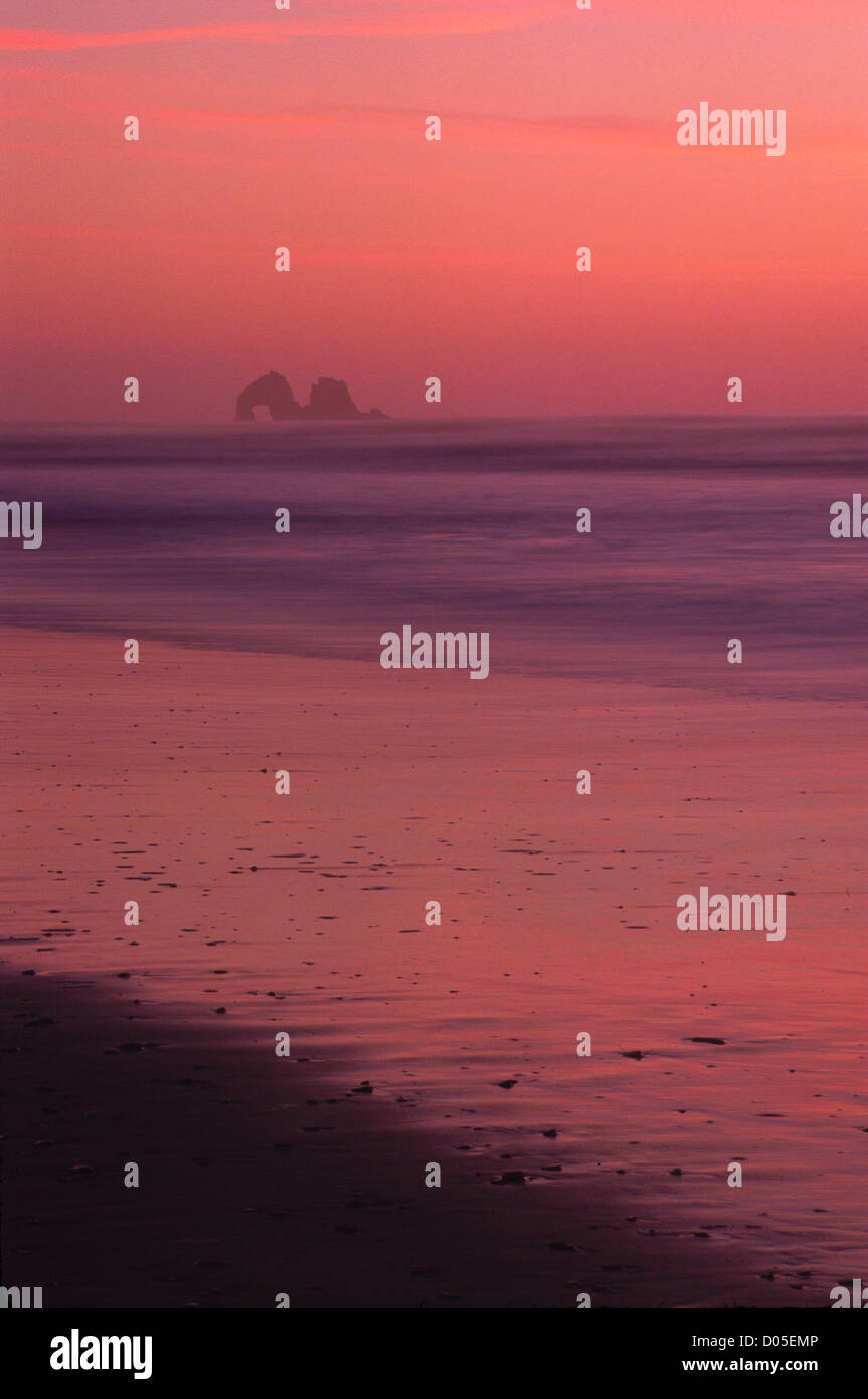 Twin Rock and Rockaway Beach at sunset, Oregon coast Stock Photo - Alamy