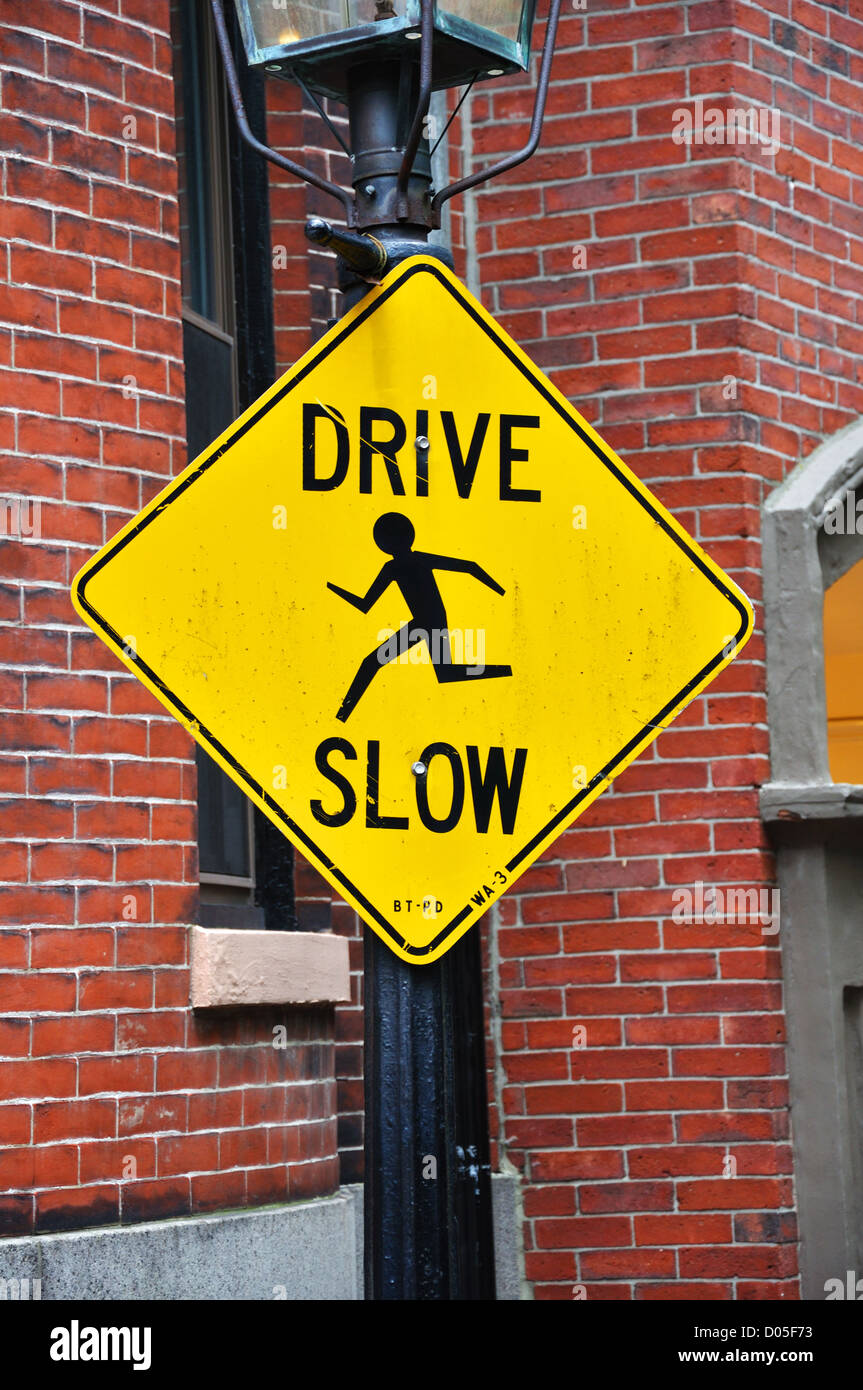 Drive Slow sign, Boston, Massachusetts, USA Stock Photo - Alamy
