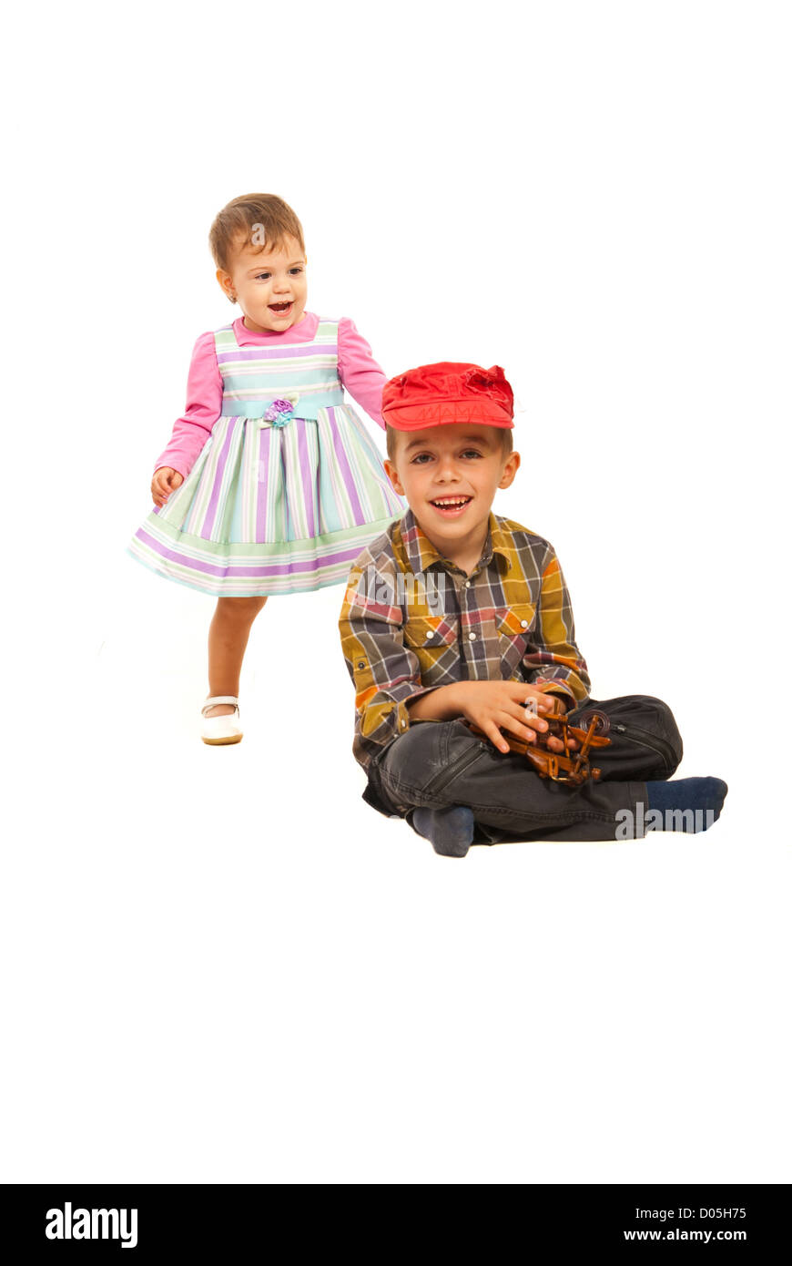 Laughing two kids having fun together isolated on white background ...