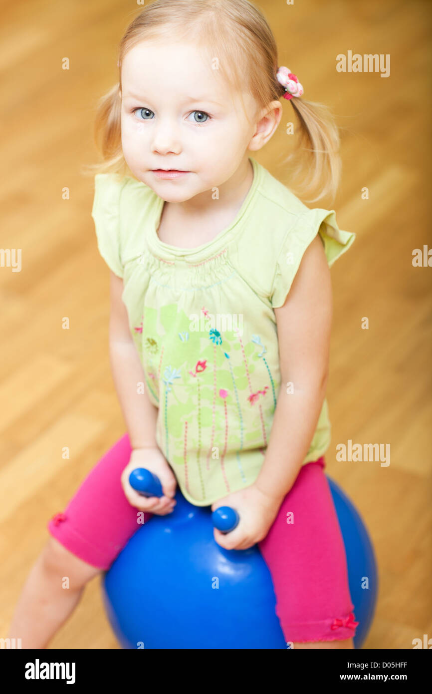 Toddler girl playing Stock Photo - Alamy
