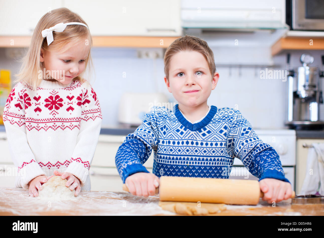 Kids baking cookies or pie Stock Photo - Alamy