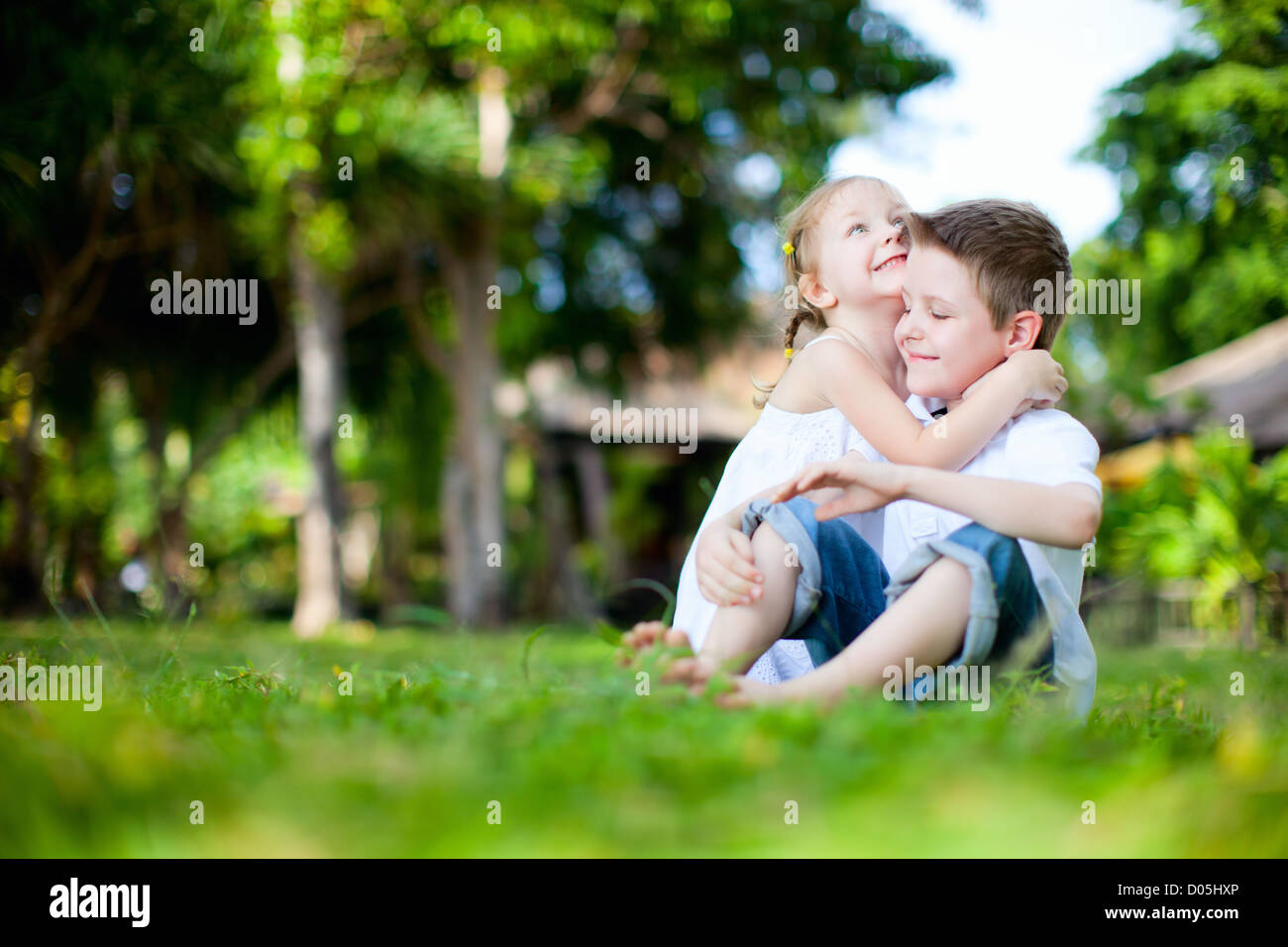 Adorable kids outdoors Stock Photo - Alamy