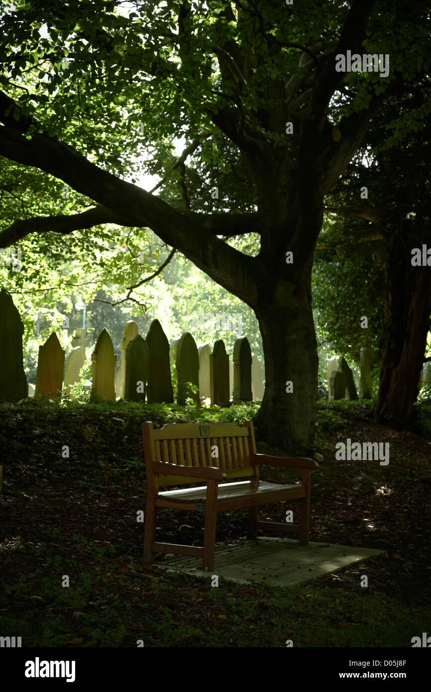 Graveyard with bench in Chester UK Stock Photo - Alamy