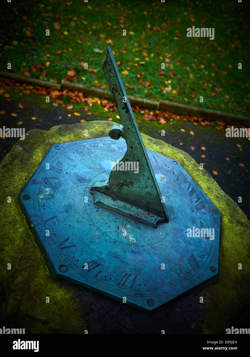 Old weathered sun dial Stock Photo - Alamy