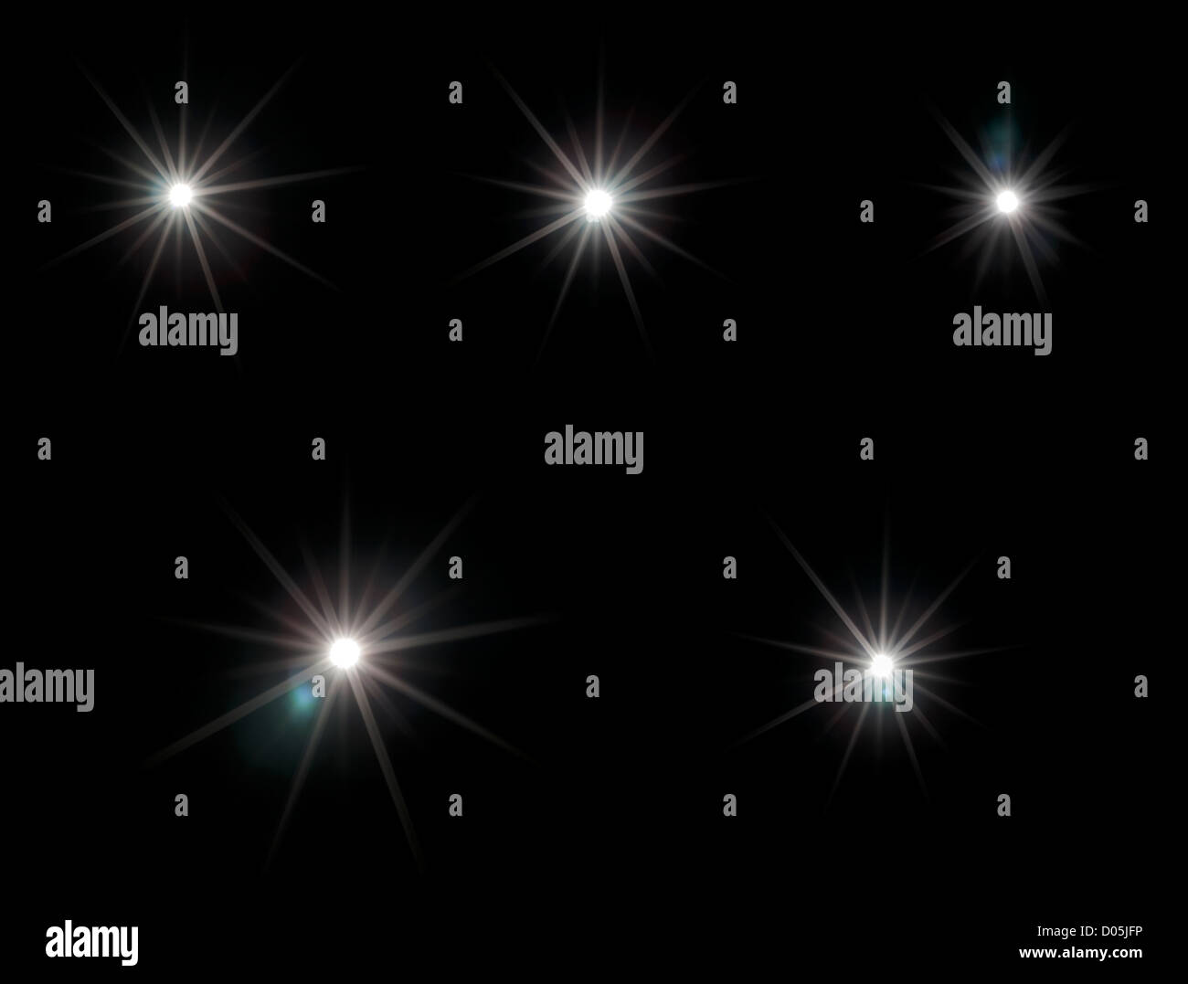 A Set of five real lens flares on black background. Round light source ...