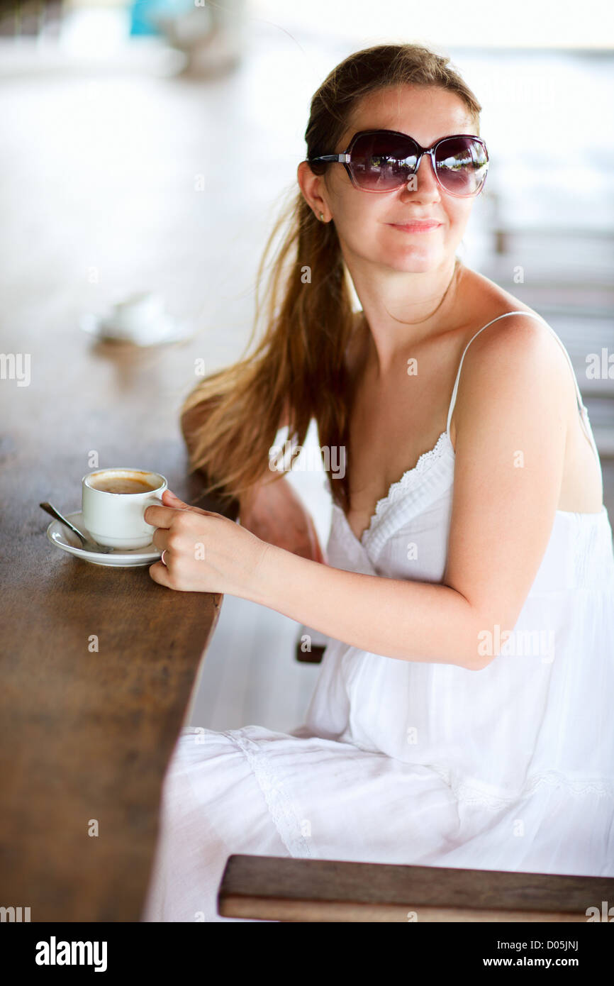 Woman in cafe Stock Photo - Alamy