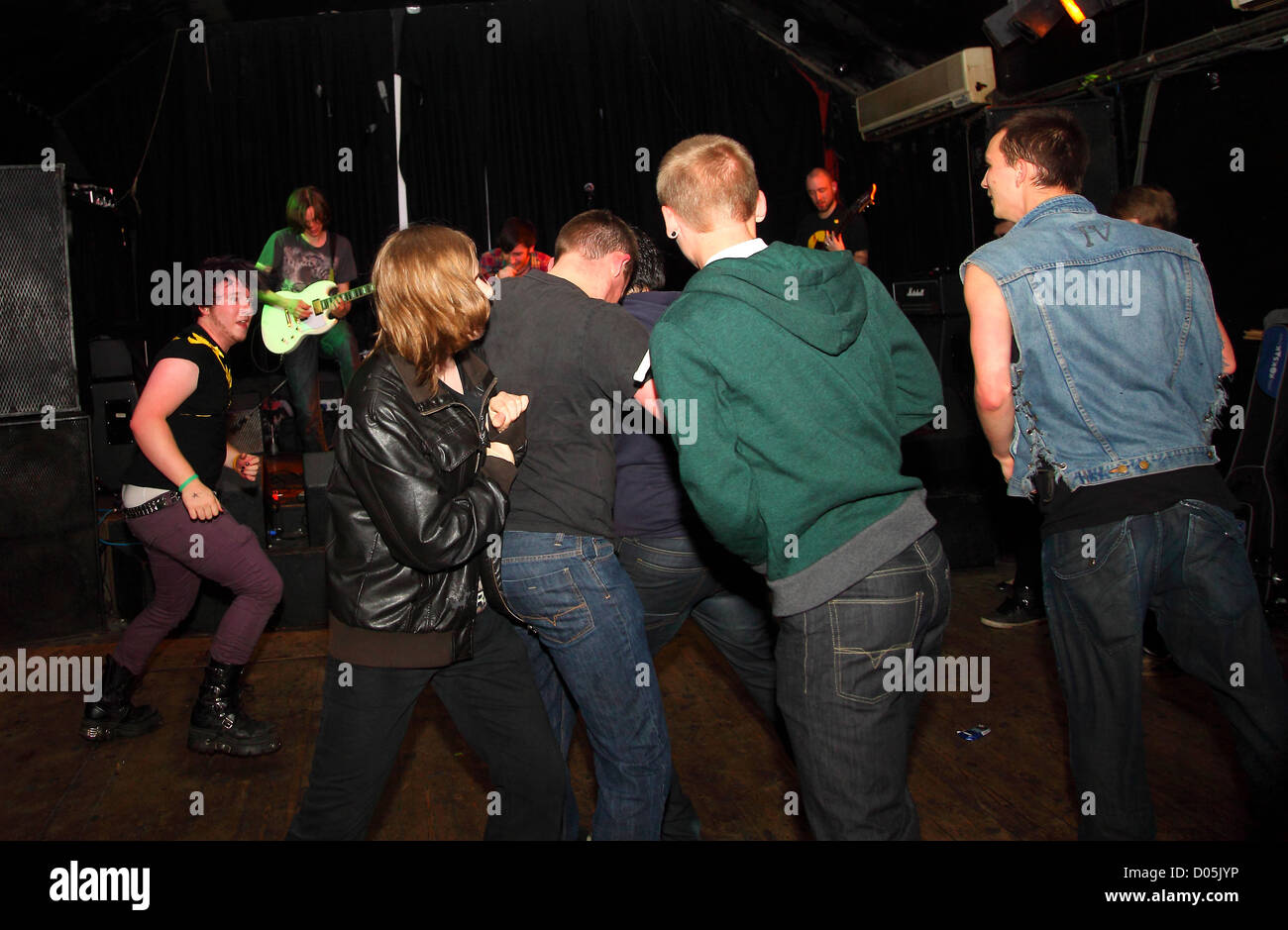 Audience at a small heavy metal gig in Bristol, they had been moshing ...