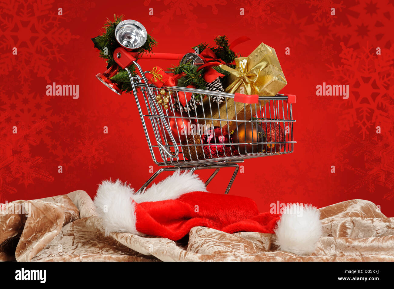 Small shopping cart with Christmas items Stock Photo - Alamy