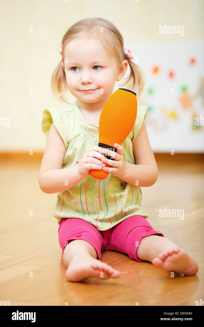 Toddler girl playing Stock Photo - Alamy