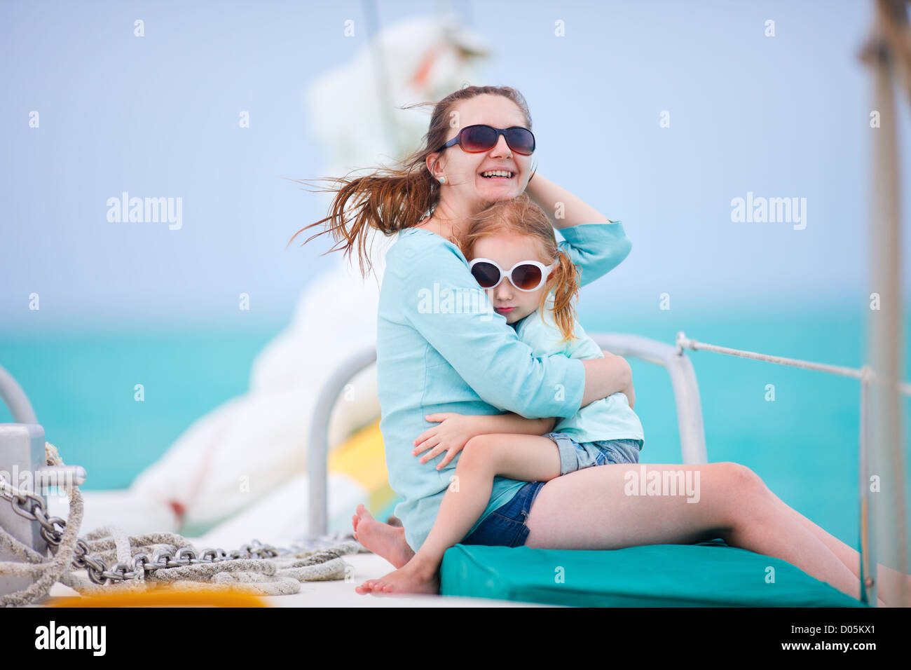 Family sailing on luxury yacht Stock Photo - Alamy