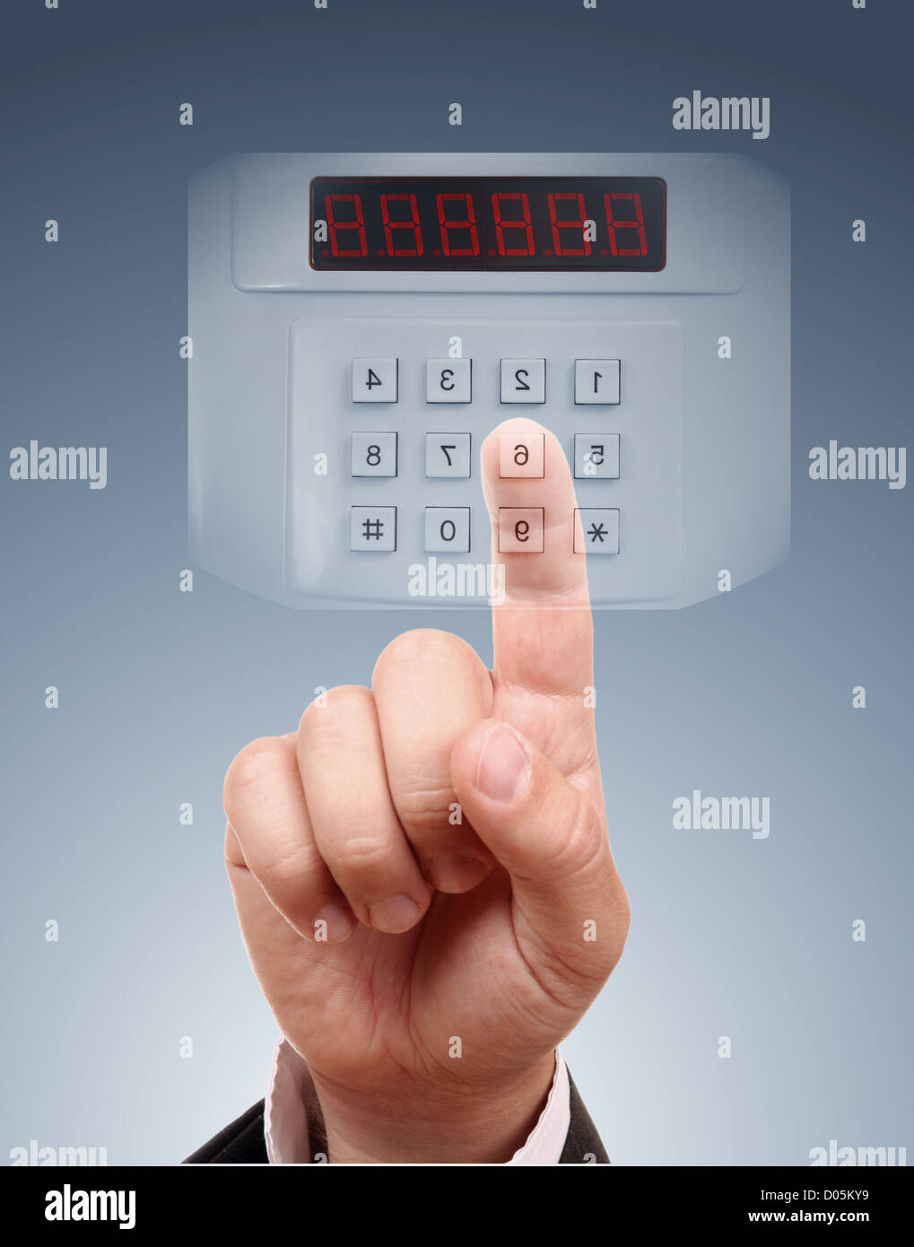 Man entering safe's code Stock Photo - Alamy