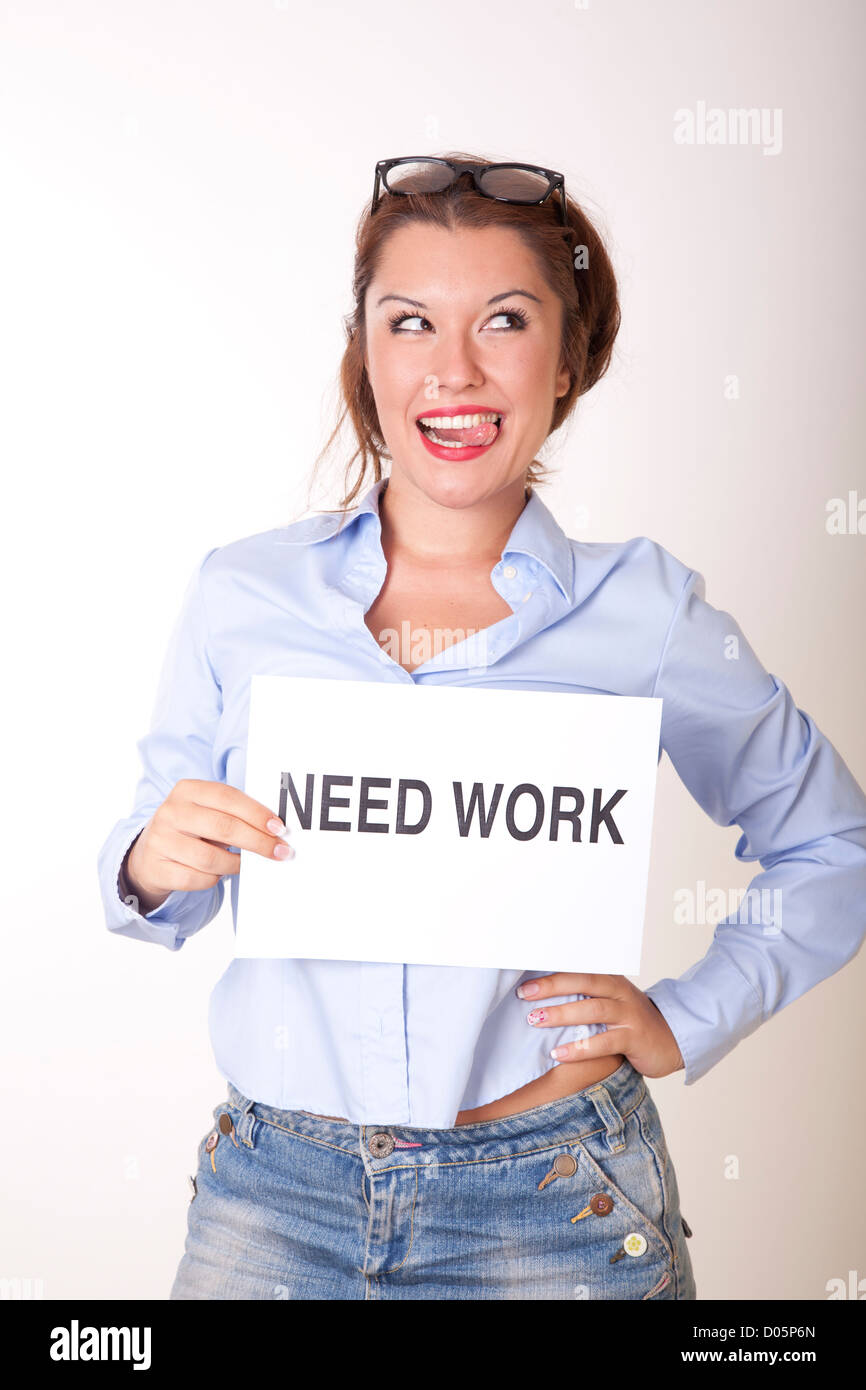 Portrait of a young beautiful woman holding a sign need work Stock ...