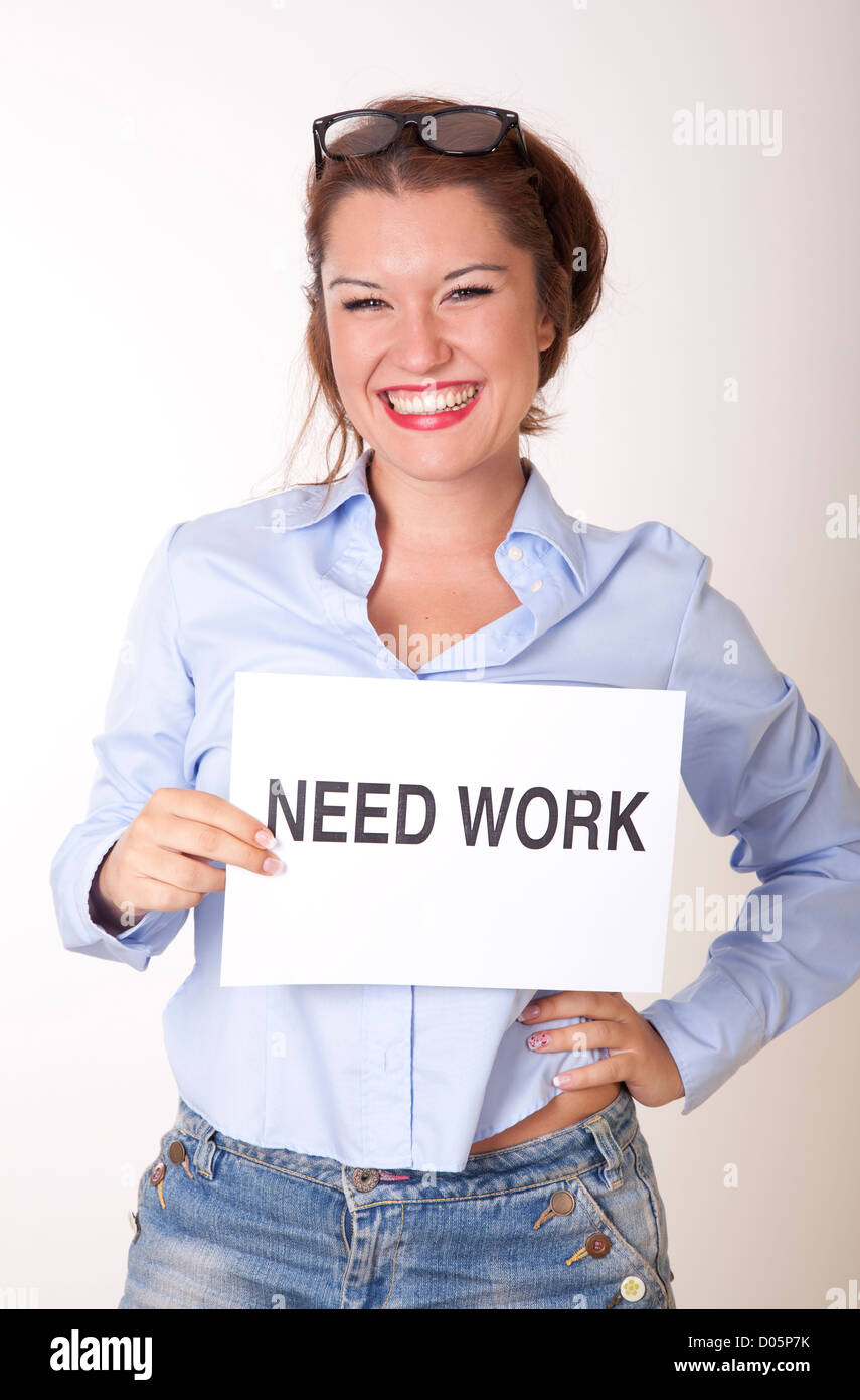 Portrait of a young beautiful woman holding a sign need work Stock ...