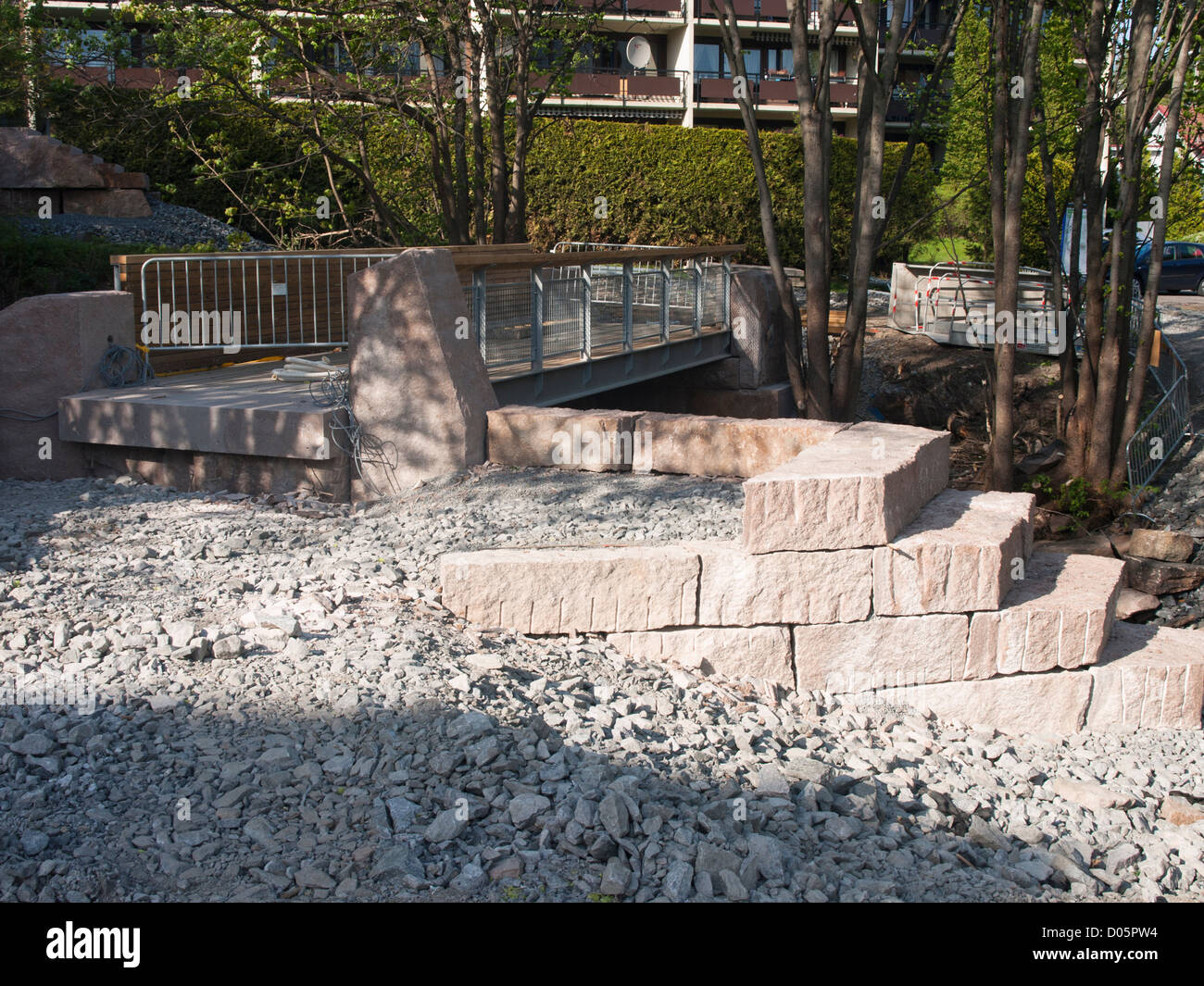 New footbridge and stone masonry making a footpath for hikers along the ...